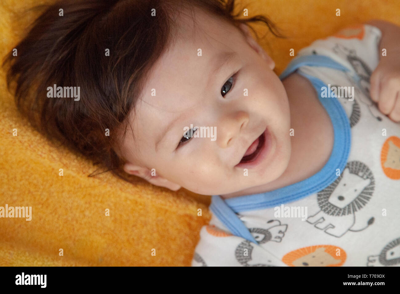 newborn on back Stock Photo - Alamy