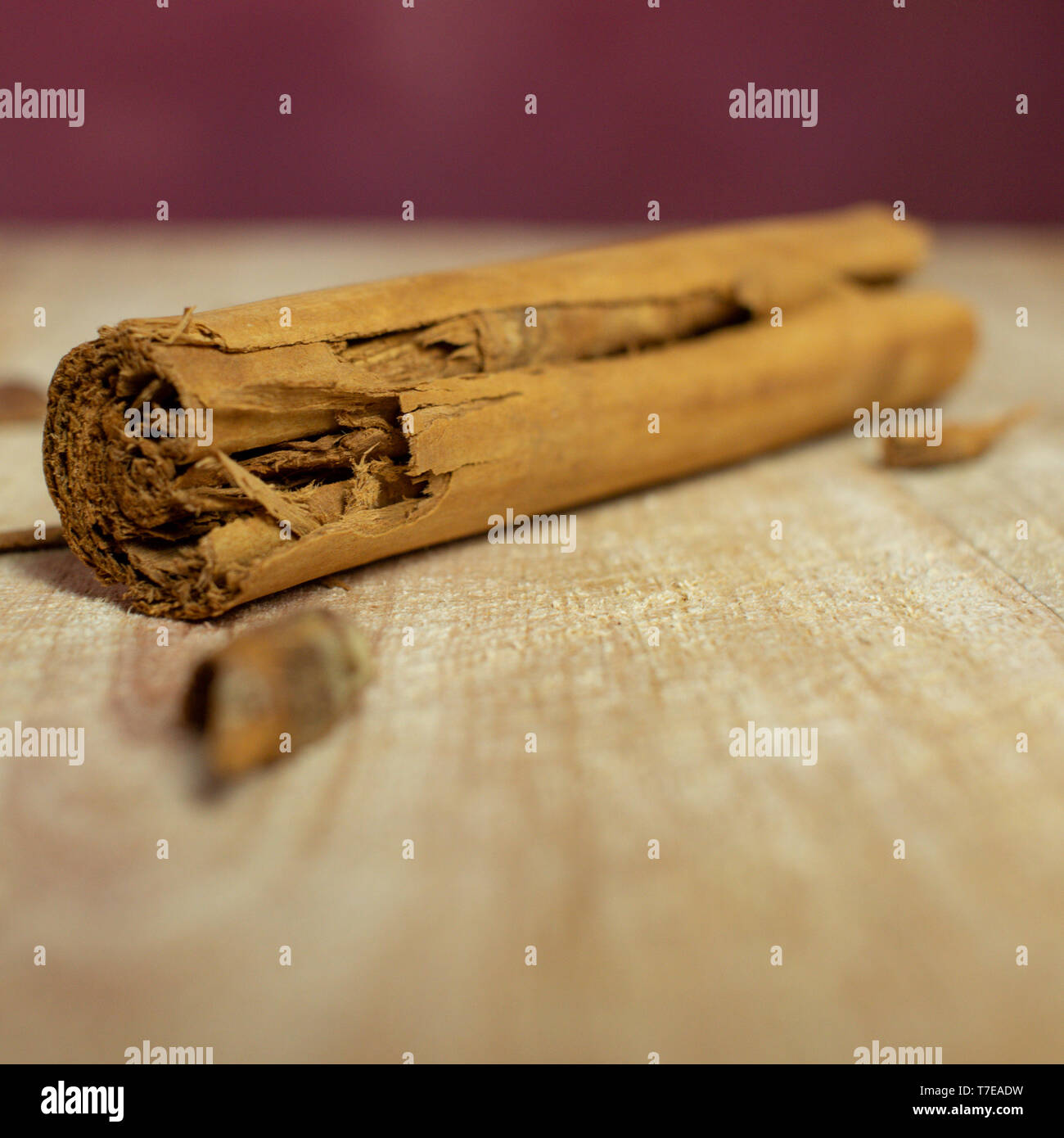 Cinnamon on Wooden Chopping Board Stock Photo - Alamy