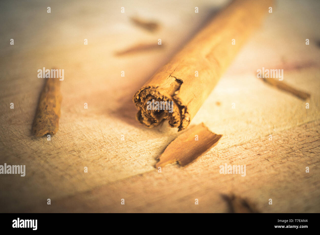 Cinnamon on Wooden Chopping Board Stock Photo - Alamy