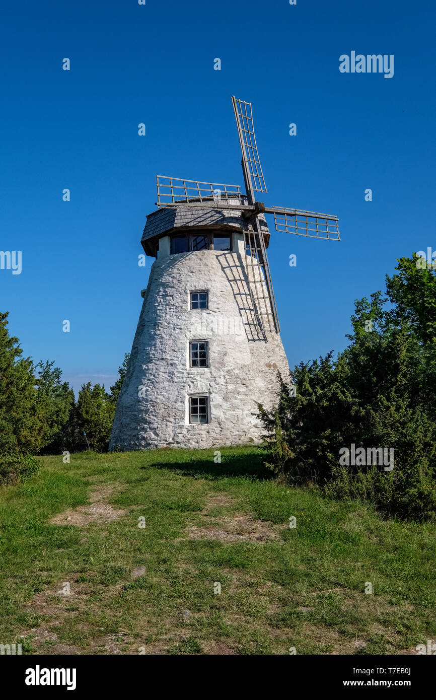 white brick windmill on blue sky background. estonia countryside Stock ...