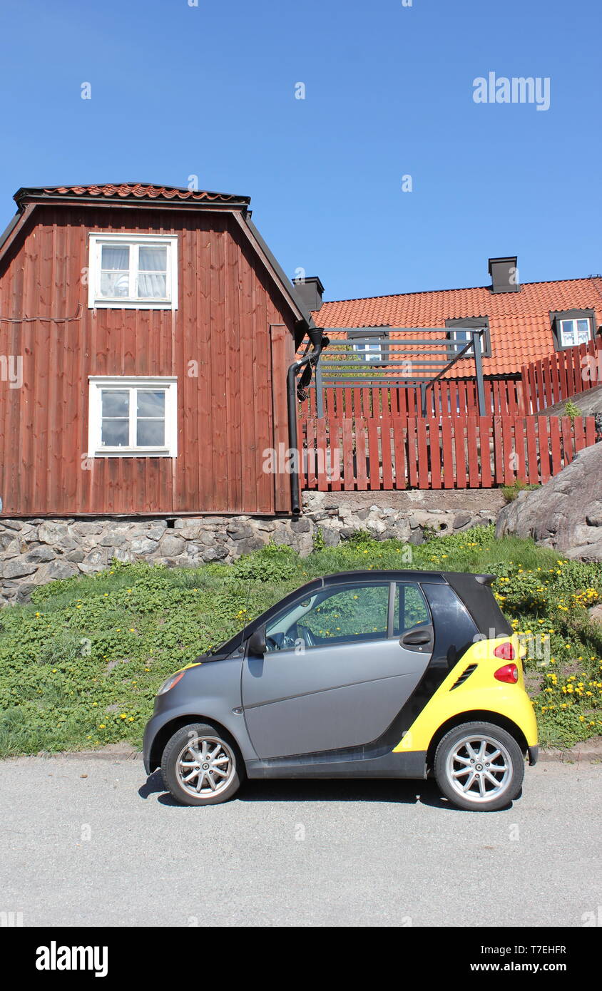 Small car on the old street Stock Photo - Alamy