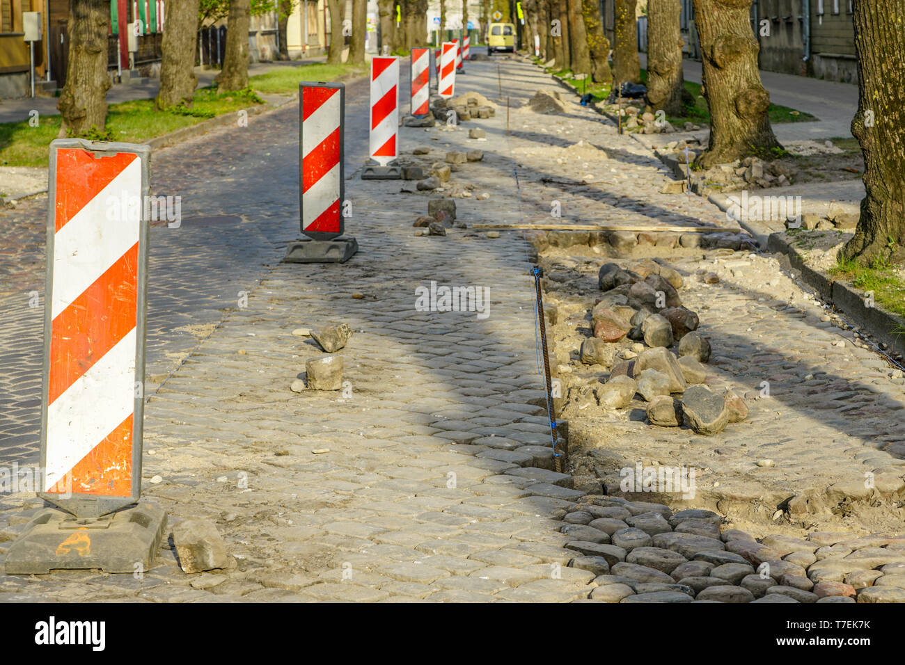 granite cobblestone pavement repair in city street, fragment of ...