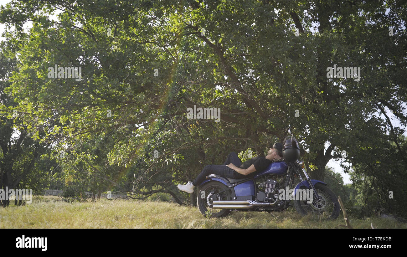 Posing vehicle journey motorcycle hi-res stock photography and images ...