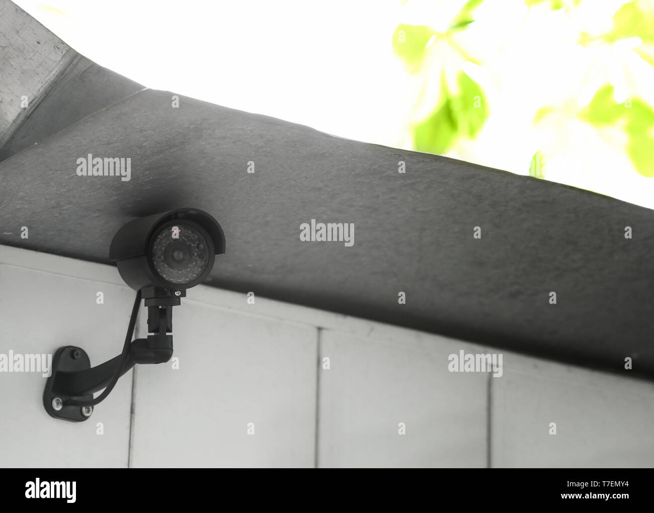 Modern CCTV camera installed on wall of building outdoors Stock Photo ...