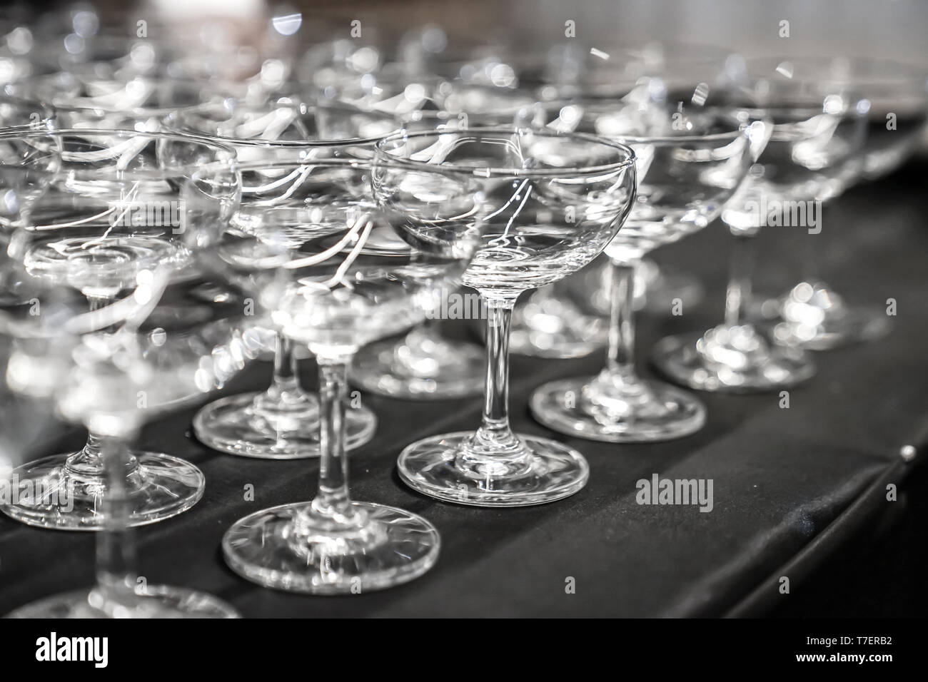 Cocktail arrange in the line on black table Stock Photo - Alamy