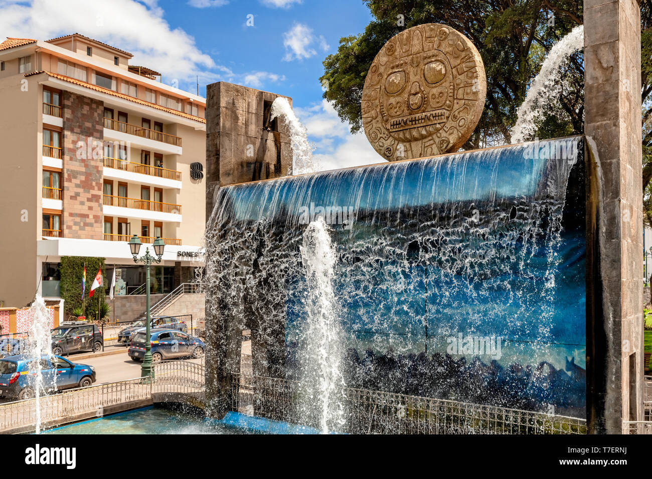 Cusco, Peru – April 3, 2019: Water fountain with Sun God sculpture on ...