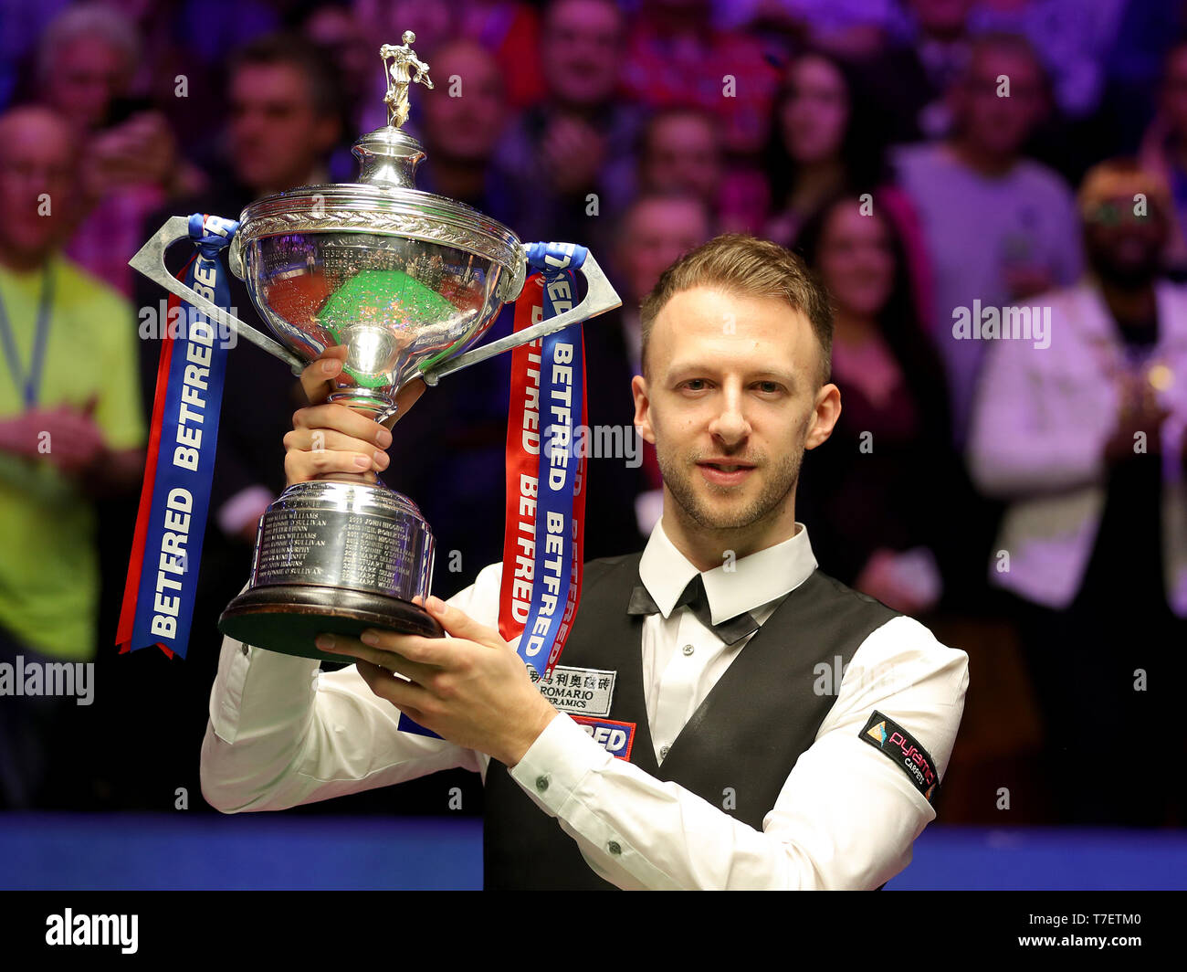 Judd Trump celebrates with the trophy after winning the 2019 Betfred ...