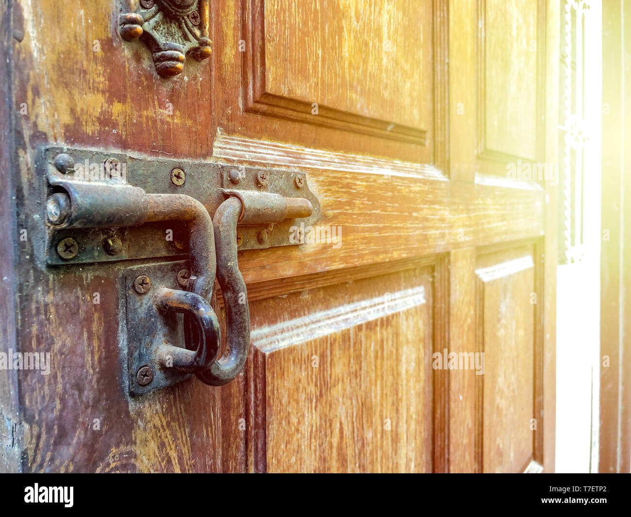 Asian vintage lock on the wooden door with sunlight effect Stock Photo ...
