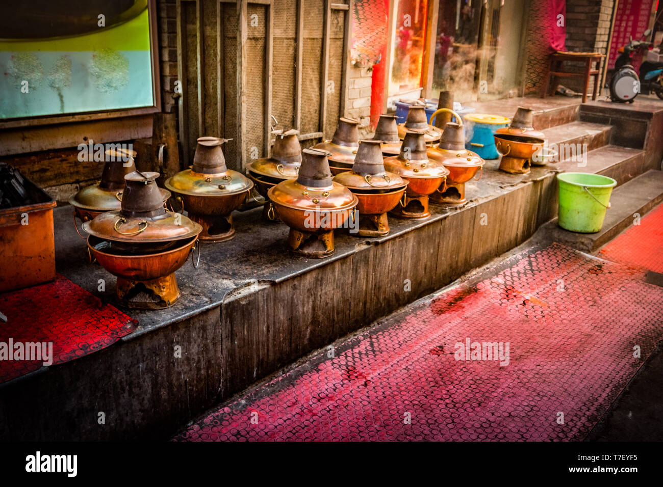 Empty copper jars for the famous Beijing hot pot, traditional chinese ...