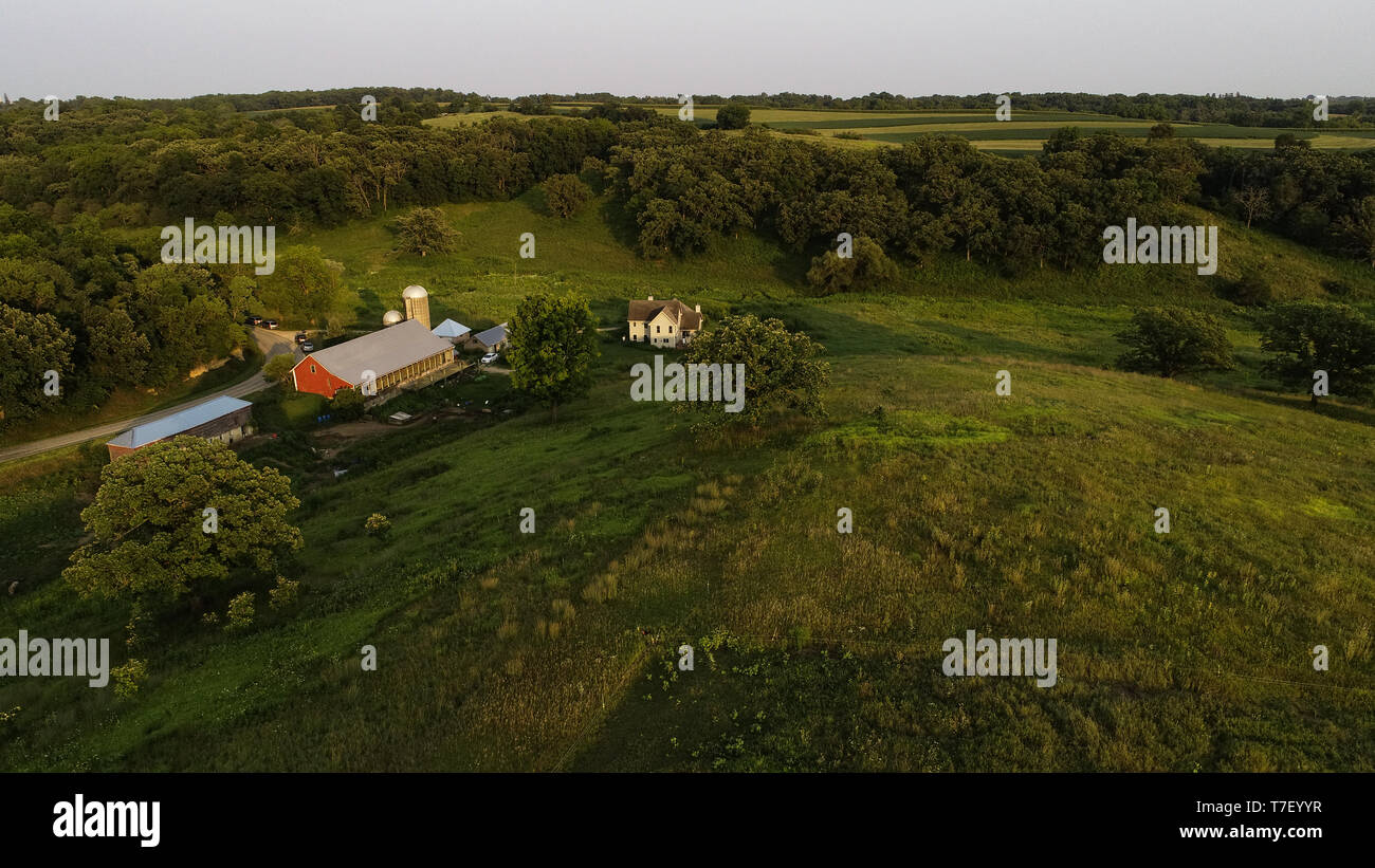 Aerial view from drone of working farm at sunset with Gloucester Old ...