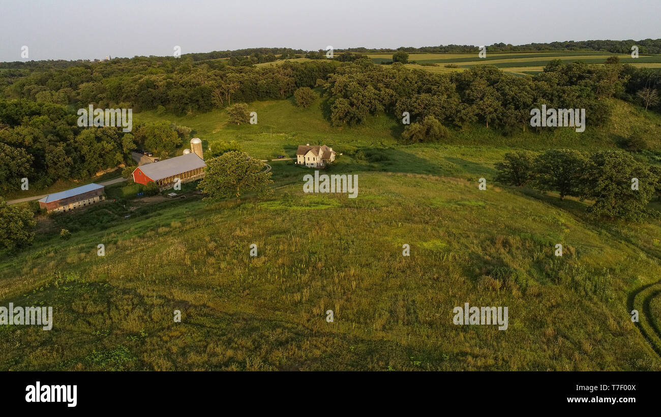 Aerial view from drone of working farm at sunset with Gloucester Old ...