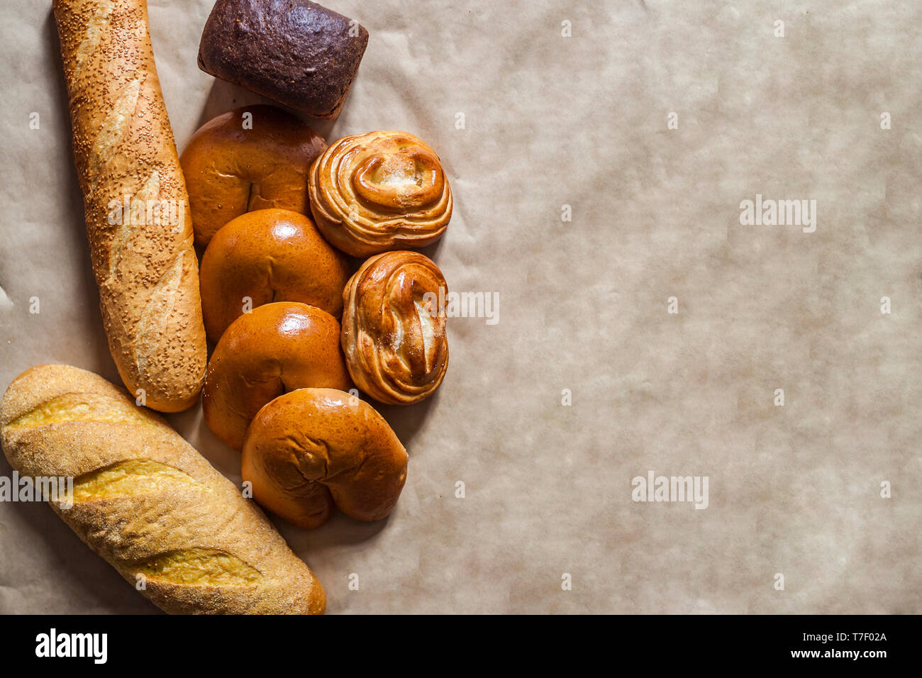Food concept. Different type breads. Top view. Free space for text ...