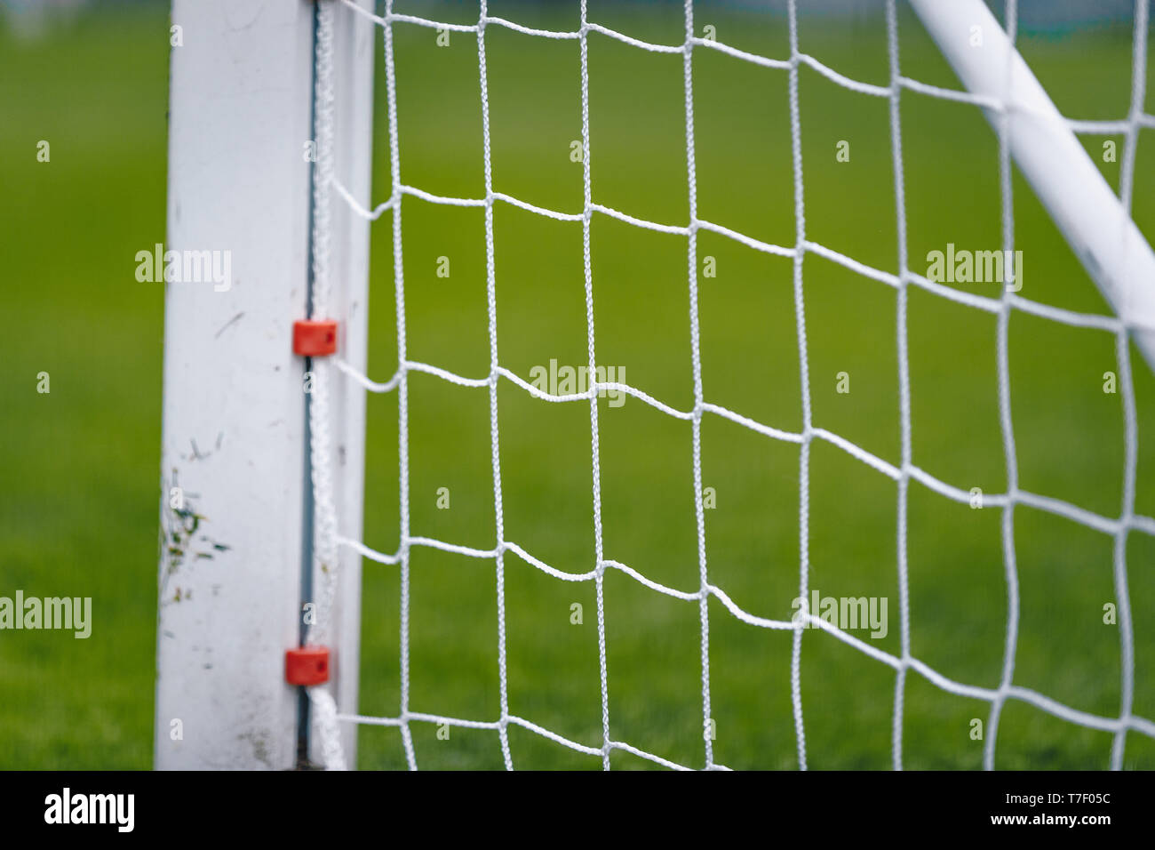 Sports Background; Net of Soccer Goal. Blurred Green Field Pitch in the ...
