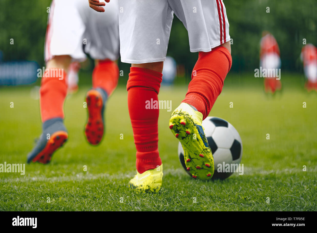 Football/Soccer Running with the Ball. Soccer Player Training on the ...