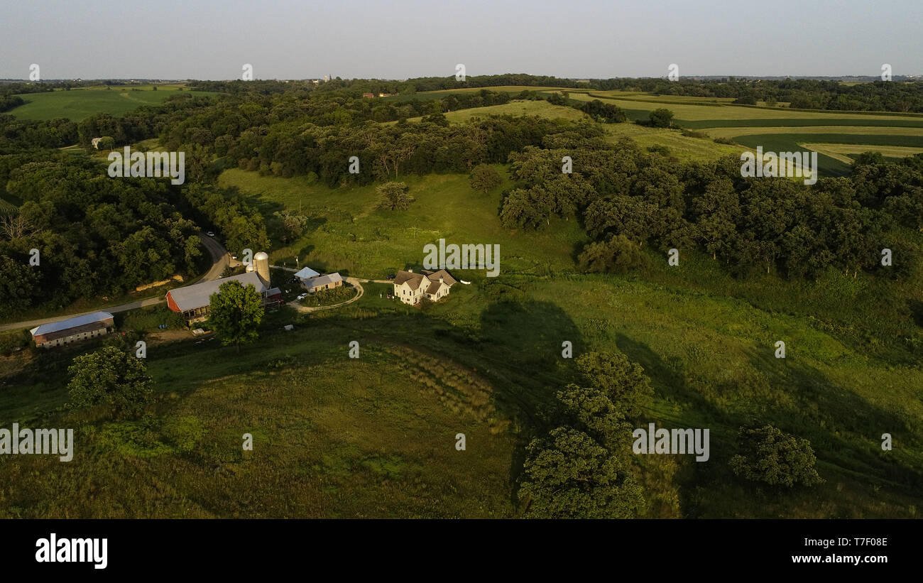 Aerial view from drone of working farm at sunset with Gloucester Old ...