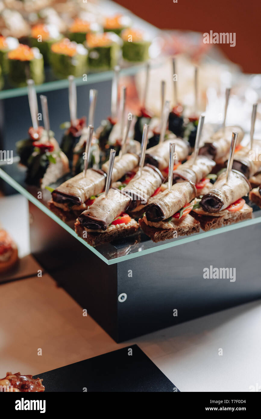 delicious festive buffet with canapés and different delicious meals ...