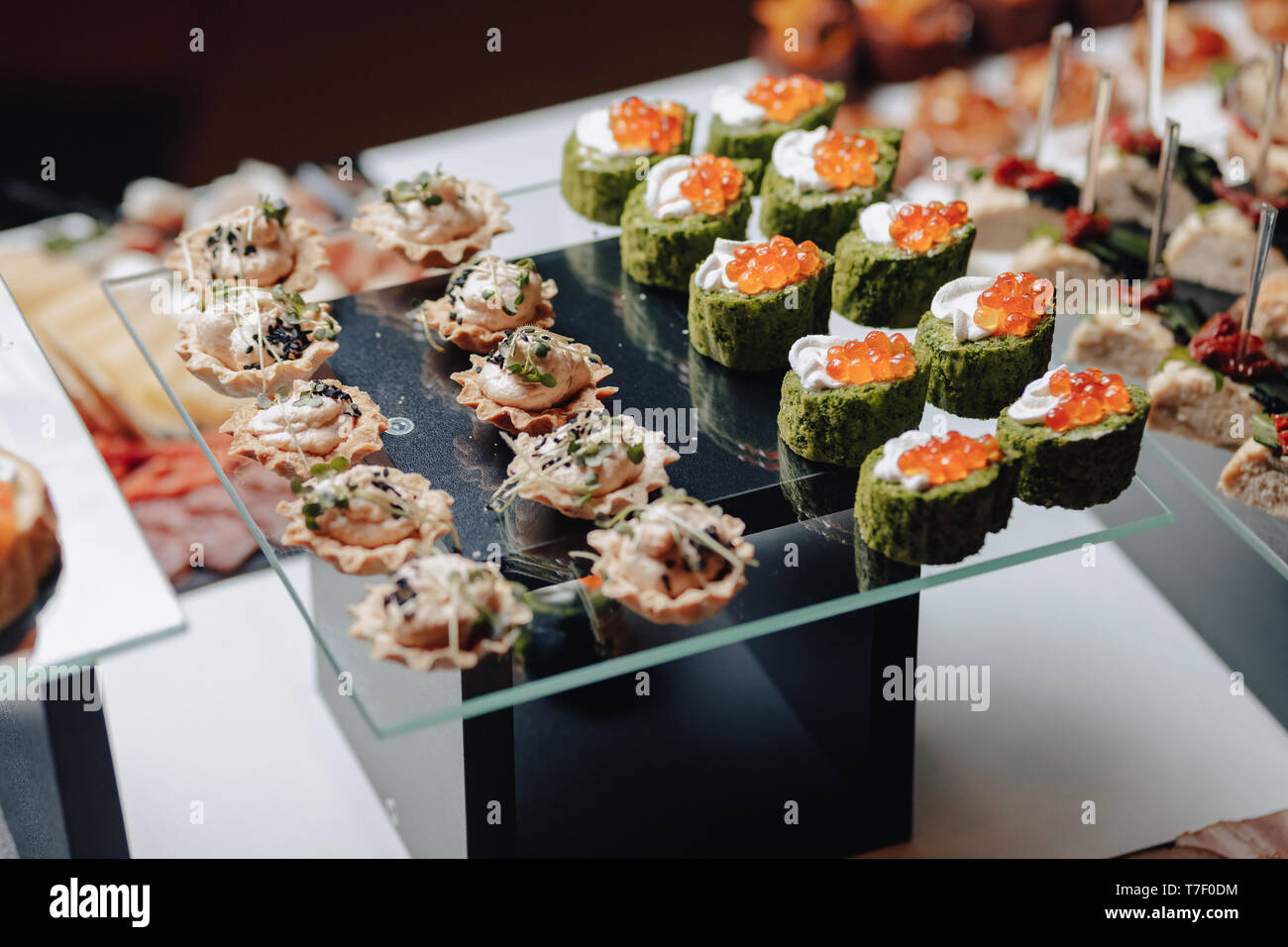 delicious festive buffet with canapés and different delicious meals ...