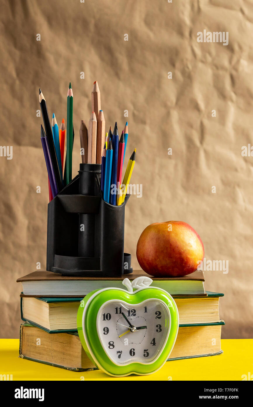 Back to school concept. Stack of books with school supplies Stock Photo ...