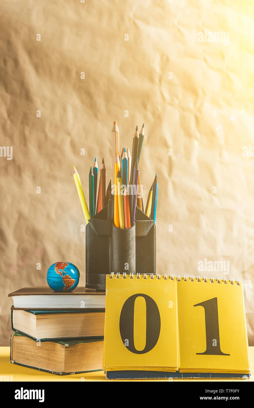Back to school concept. Stack of books with school supplies Stock Photo ...