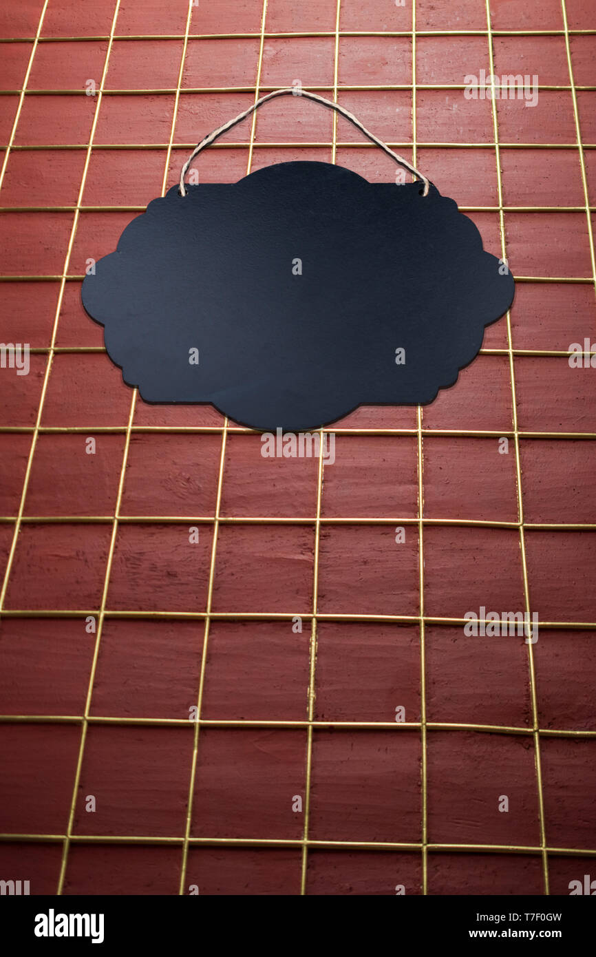 Black Empty Sign Board with string for hanging on wall Stock Photo - Alamy