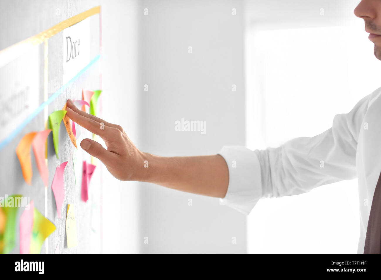 Attaching stickers hi-res stock photography and images - Alamy