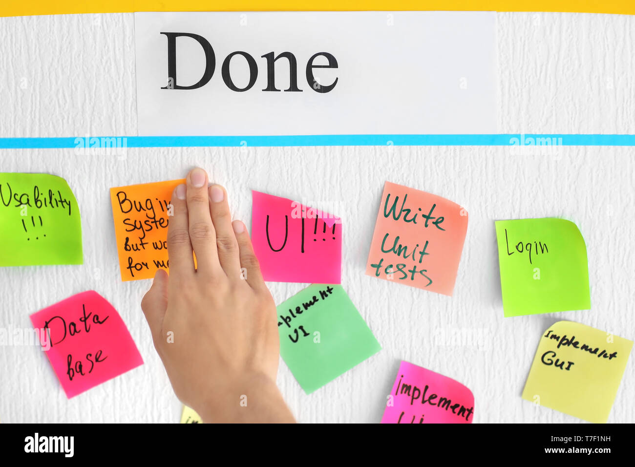 Attaching stickers hi-res stock photography and images - Alamy