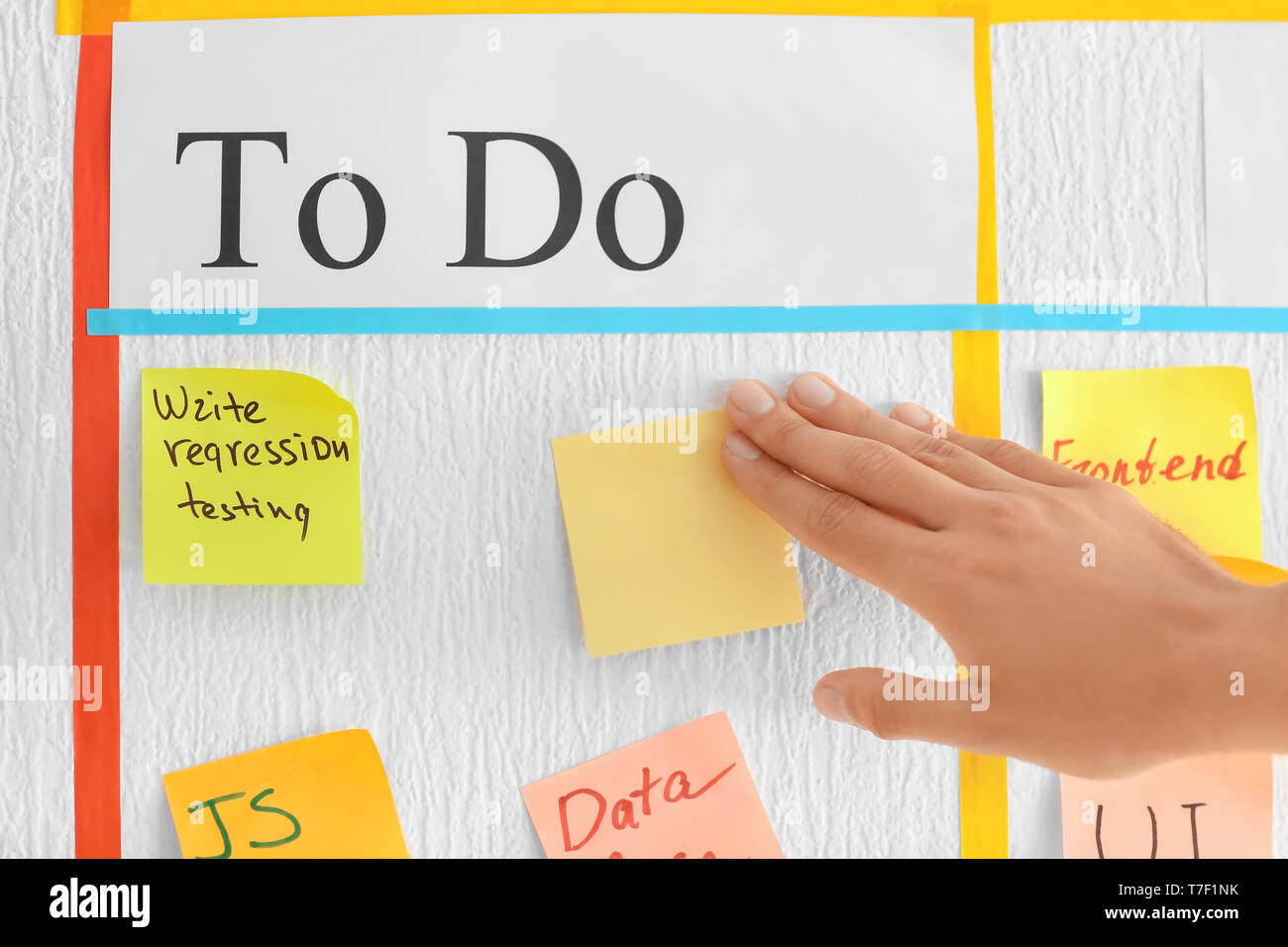 Attaching stickers hi-res stock photography and images - Alamy