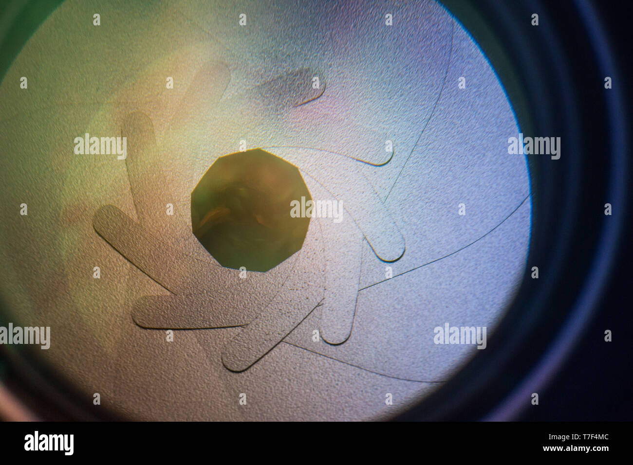 Camera lens aperture detail with colorful lens reflections Stock Photo ...