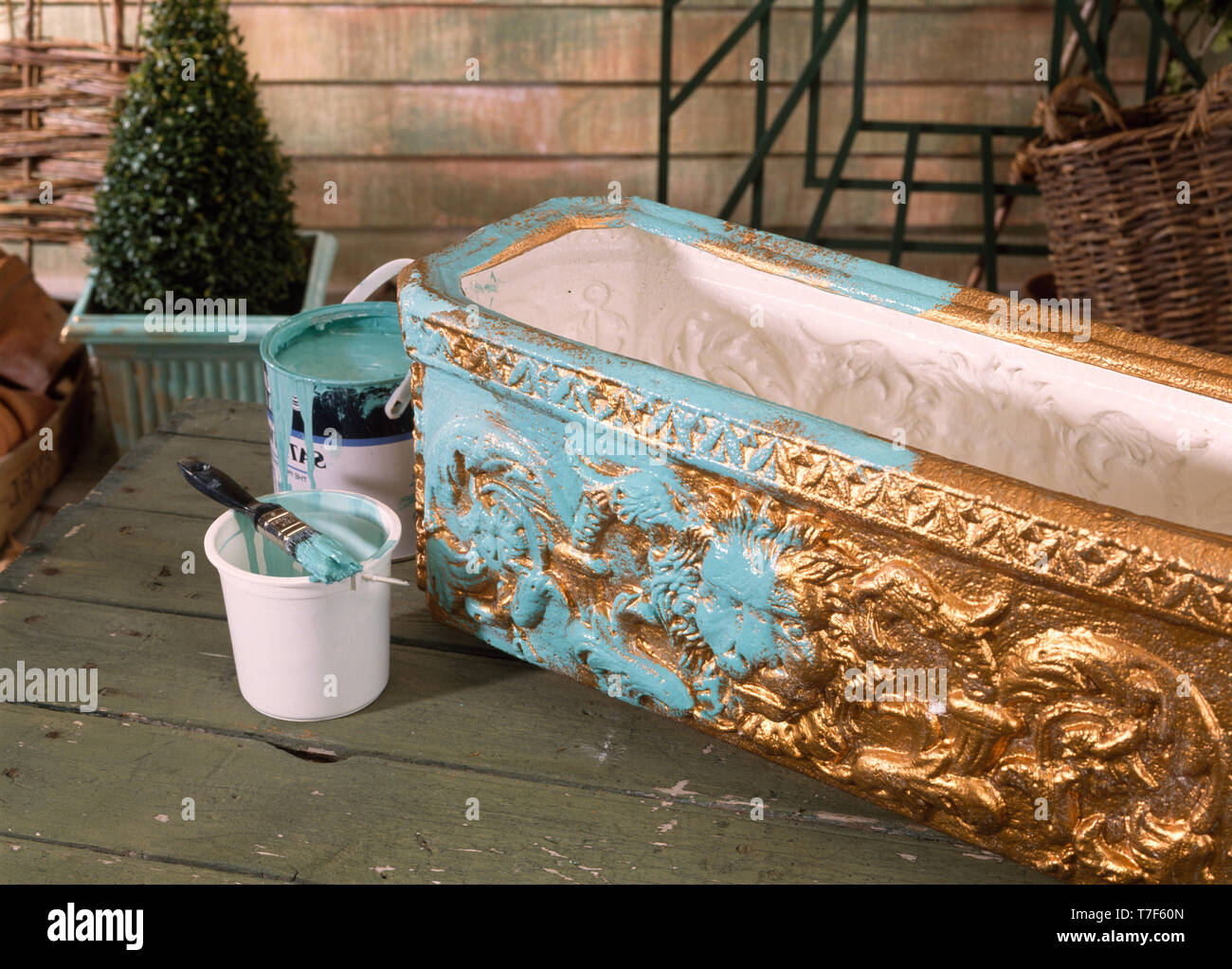 Garden planter in process of decoration Stock Photo - Alamy