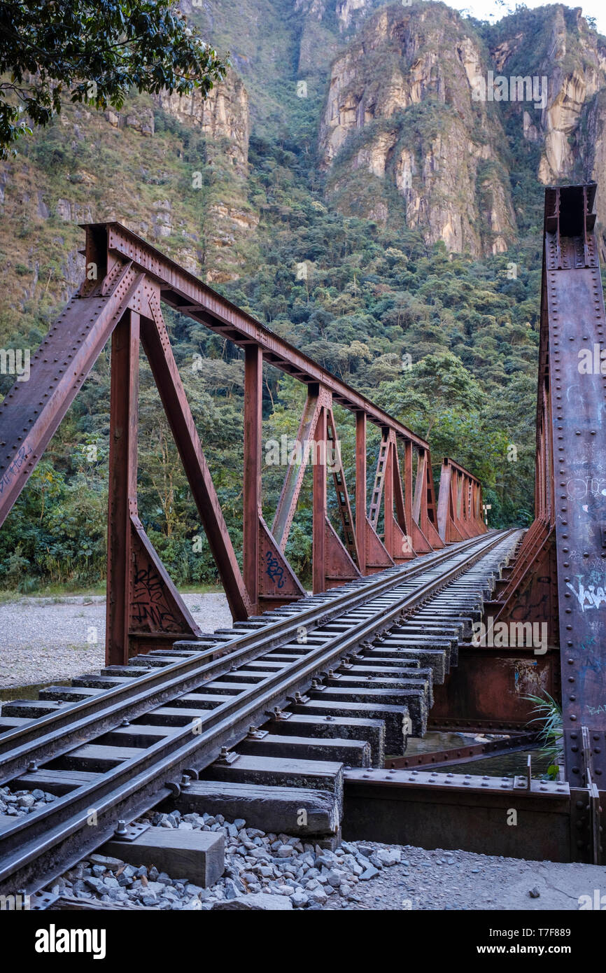 Metal bridge over Urubamba River on the railway to Aguas Calientes and ...