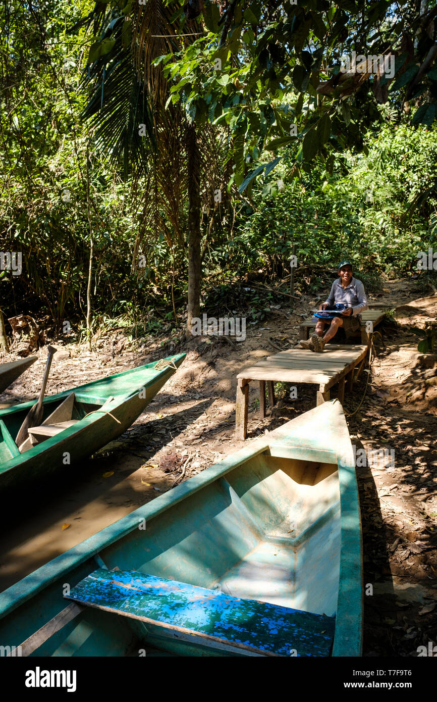 Boats through the mangroves to reach Lake Sandoval in Peruvian Amazon ...