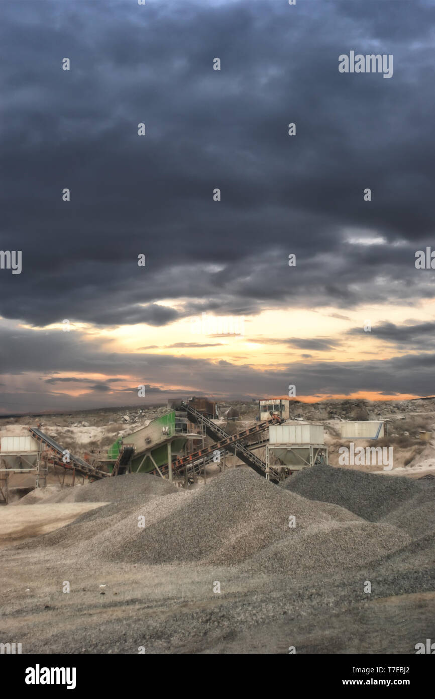 Stone quarry at sunset Stock Photo - Alamy