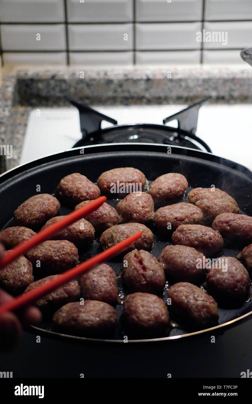 Meatballs cooking preparation at home close up Stock Photo - Alamy
