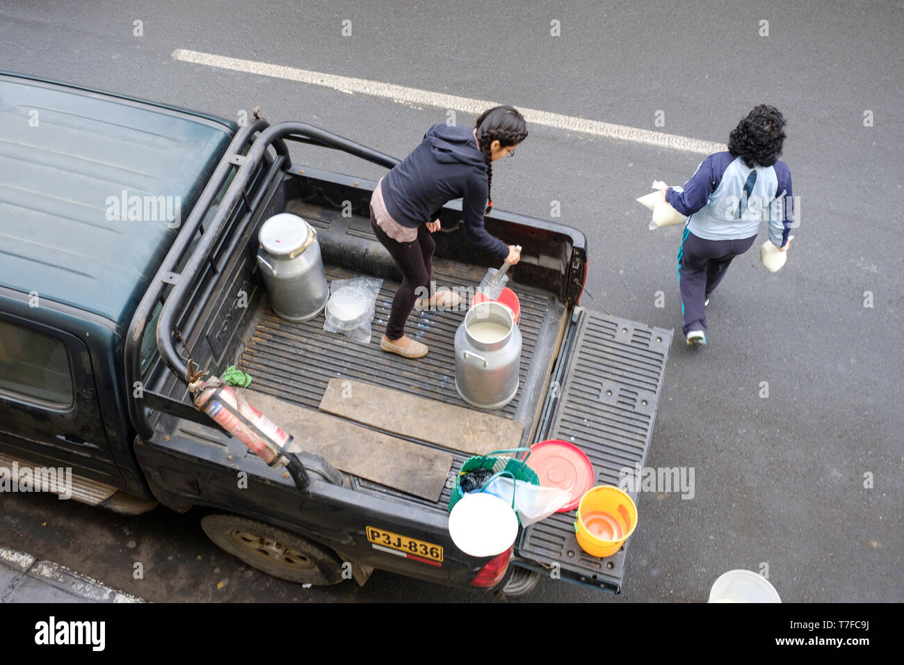 Milk sale on the streets of barranca, Lima Region, Peru Stock Photo - Alamy