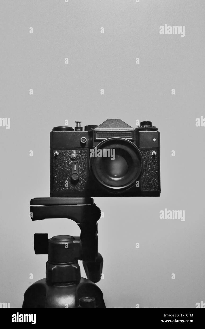 Old film camera on tripod hi-res stock photography and images - Alamy