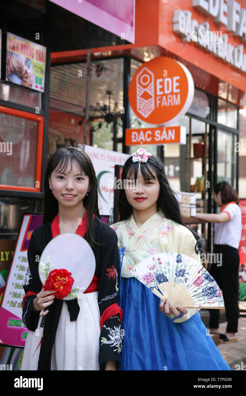 two beautiful girls are going out to the festival Stock Photo - Alamy