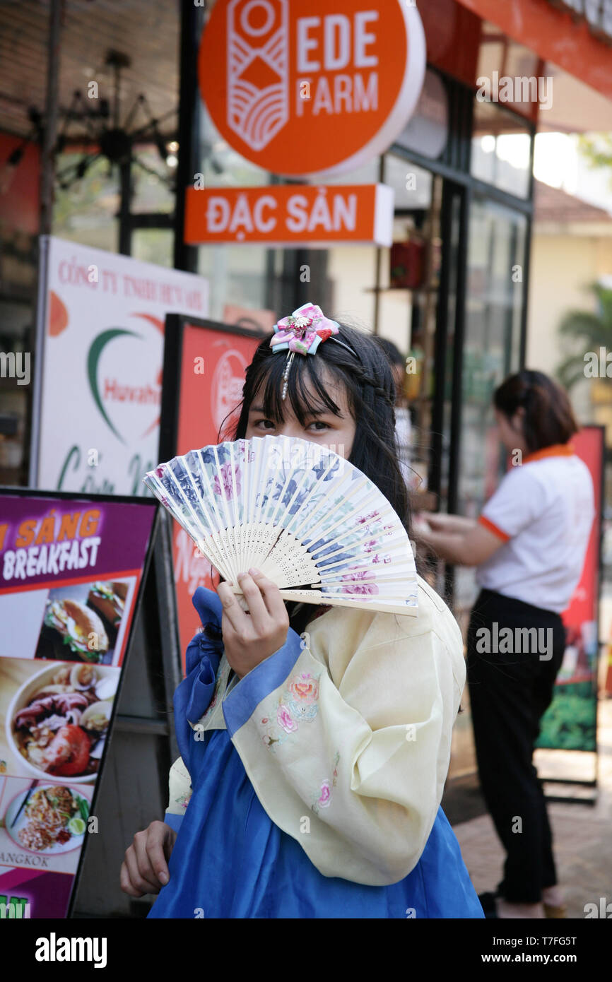 Girl with a fan hi-res stock photography and images - Alamy