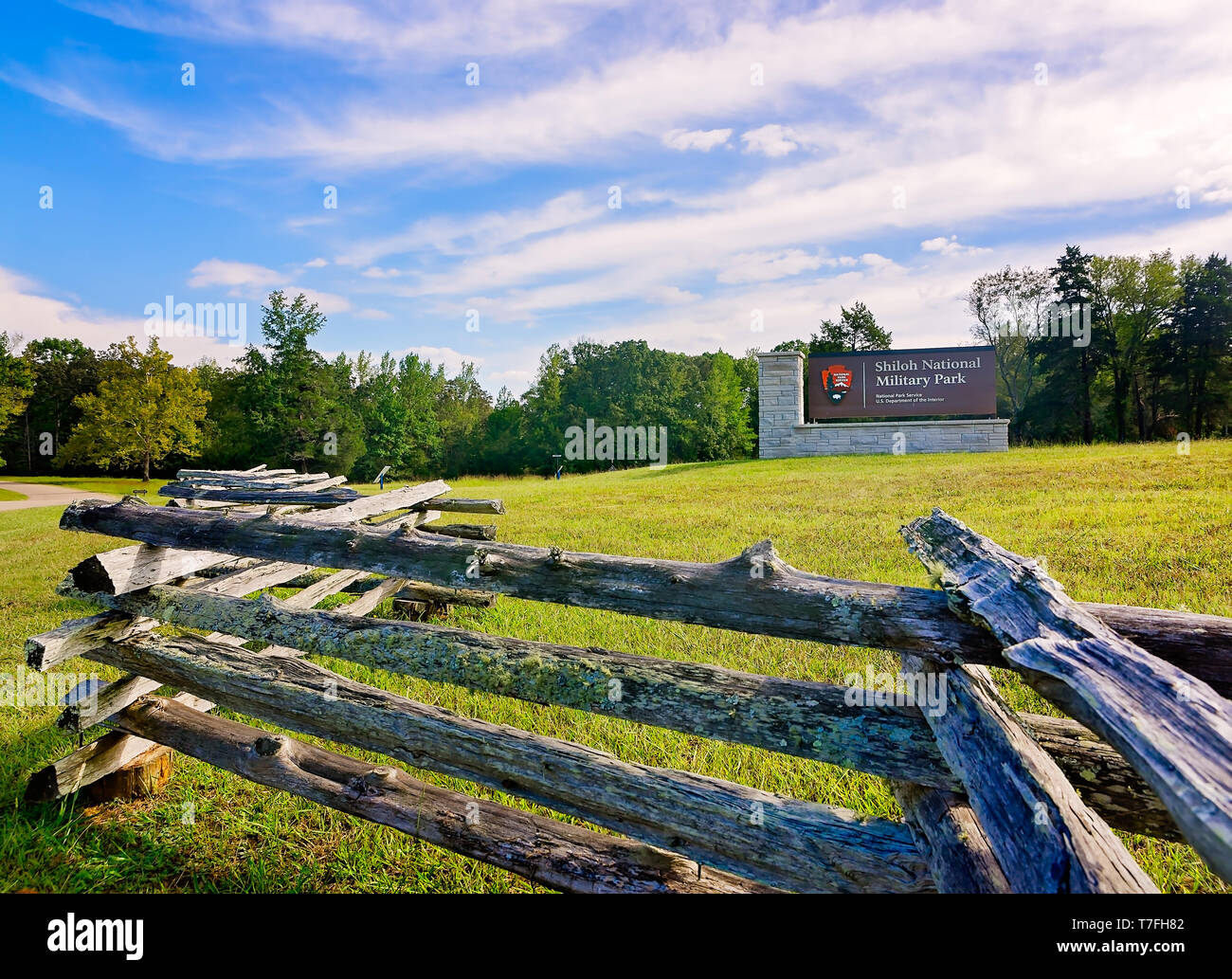The Shiloh National Military Park entrance features a sign and a zig ...