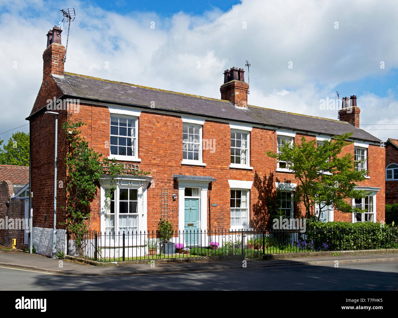 Brick-built houses in the village of Bubwith, East Yorkshire, England ...