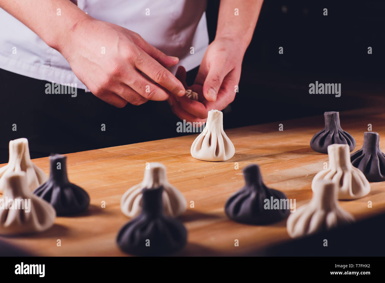 National Georgian cuisine Khinkali metal background Cook prepares ...