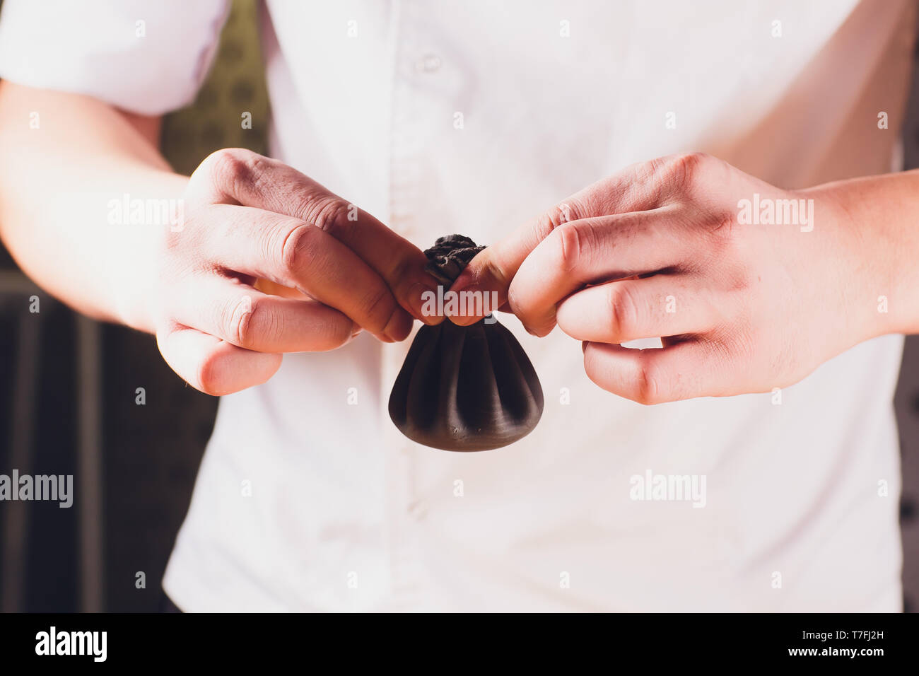 National Georgian cuisine Khinkali metal background Cook prepares ...