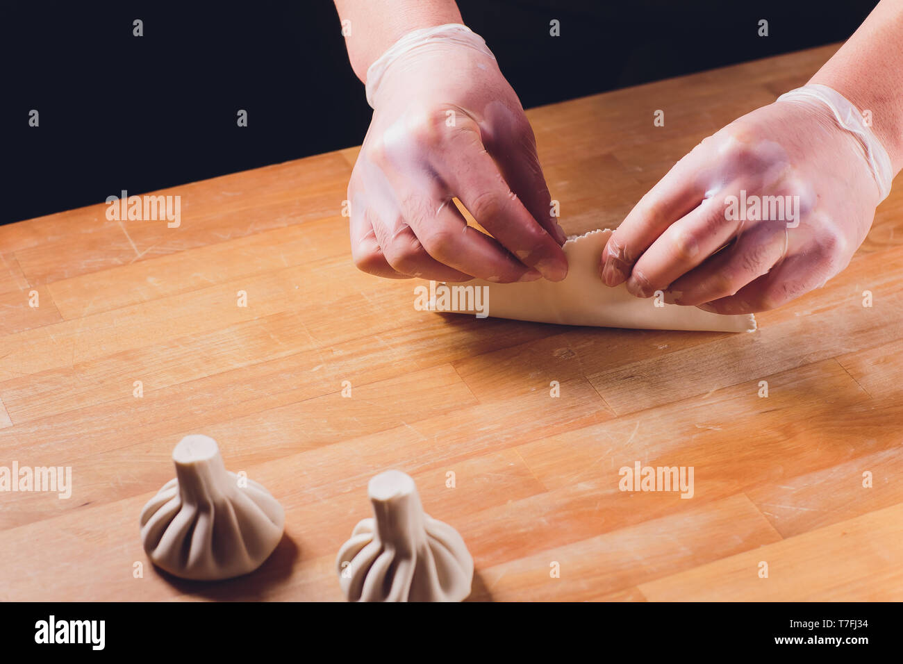 National Georgian cuisine Khinkali metal background Cook prepares ...