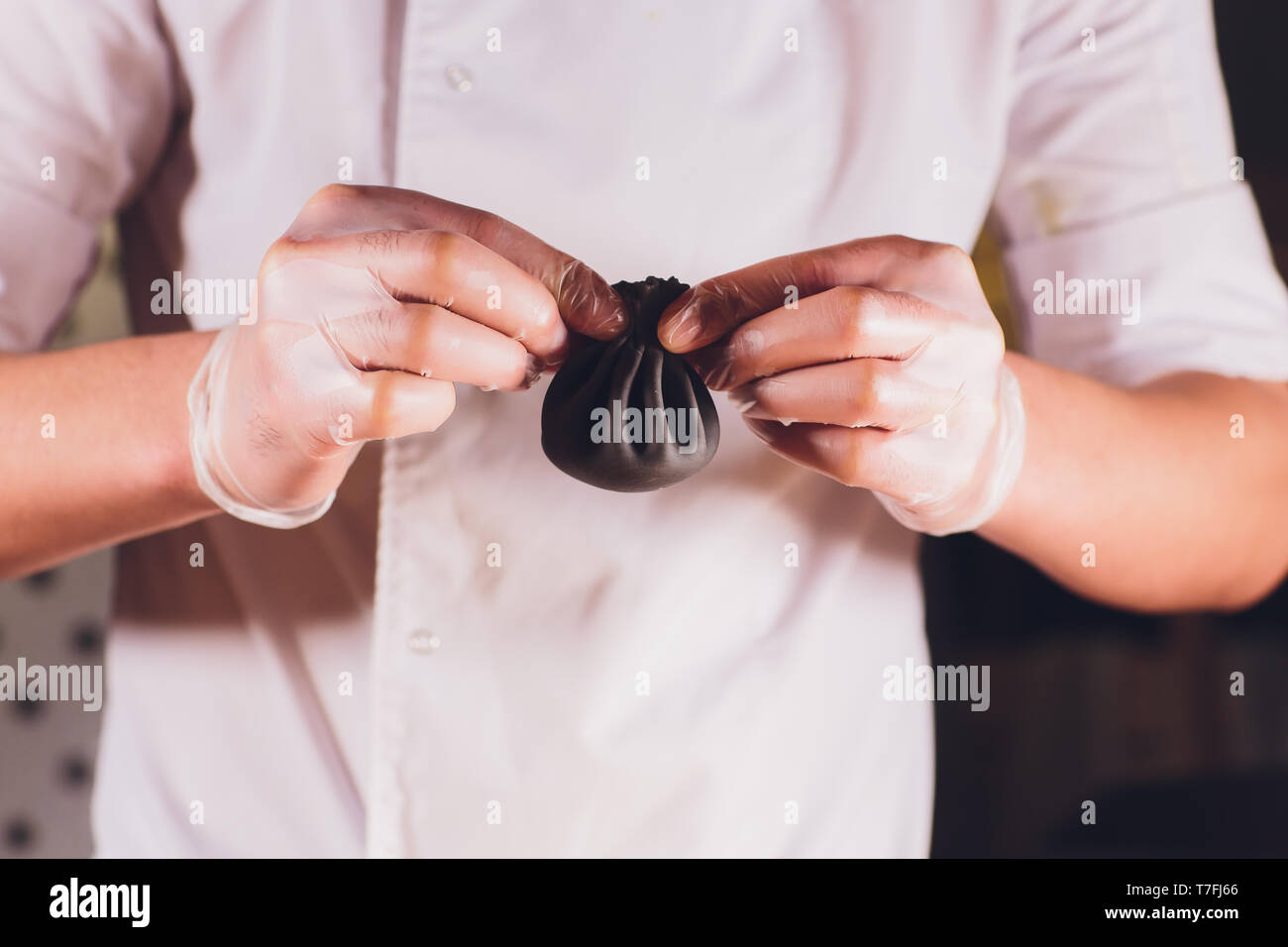 National Georgian cuisine Khinkali metal background Cook prepares ...