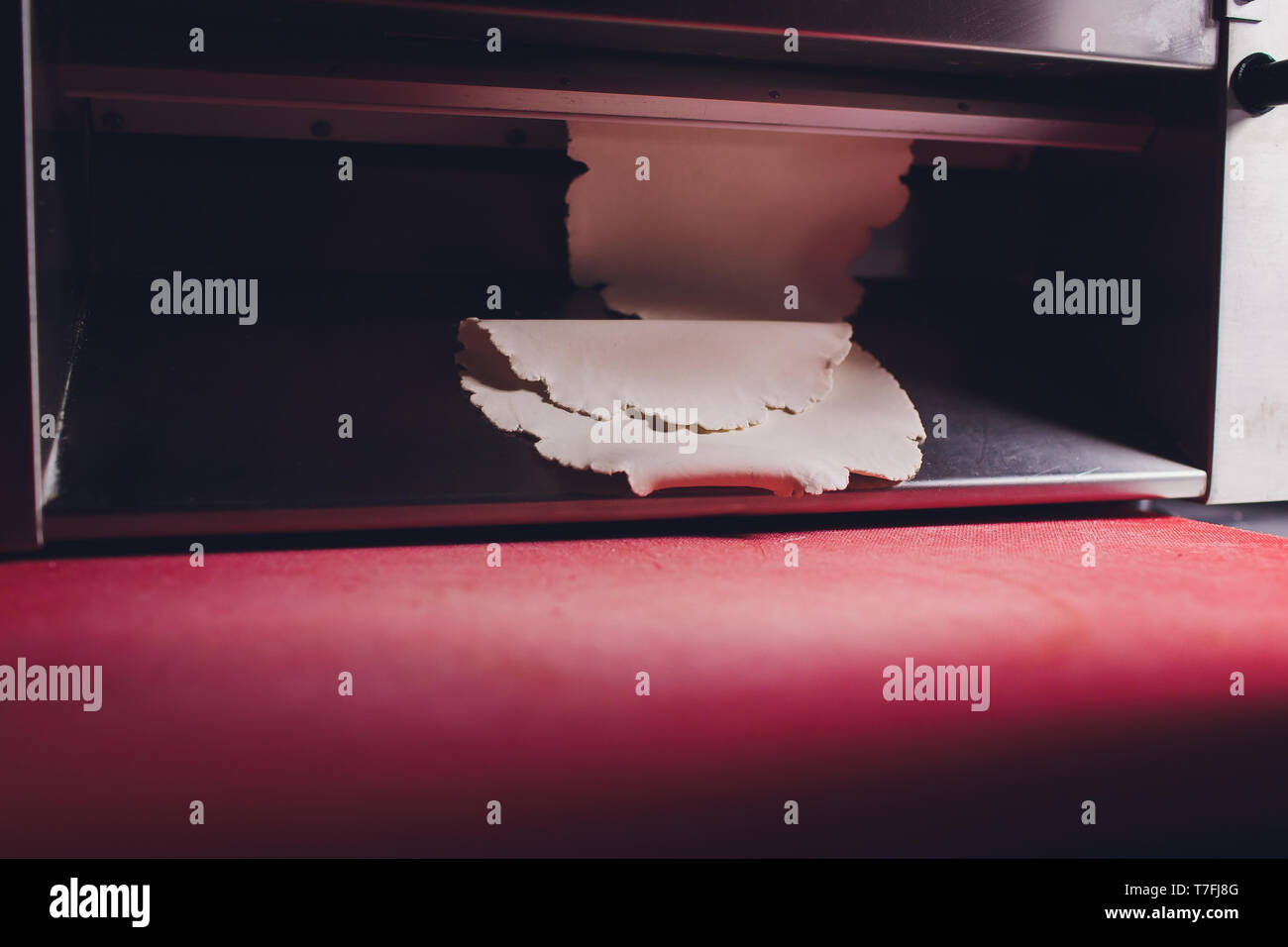 Chef making dough pastry sheeter bakery Baker forming shaping dough ...