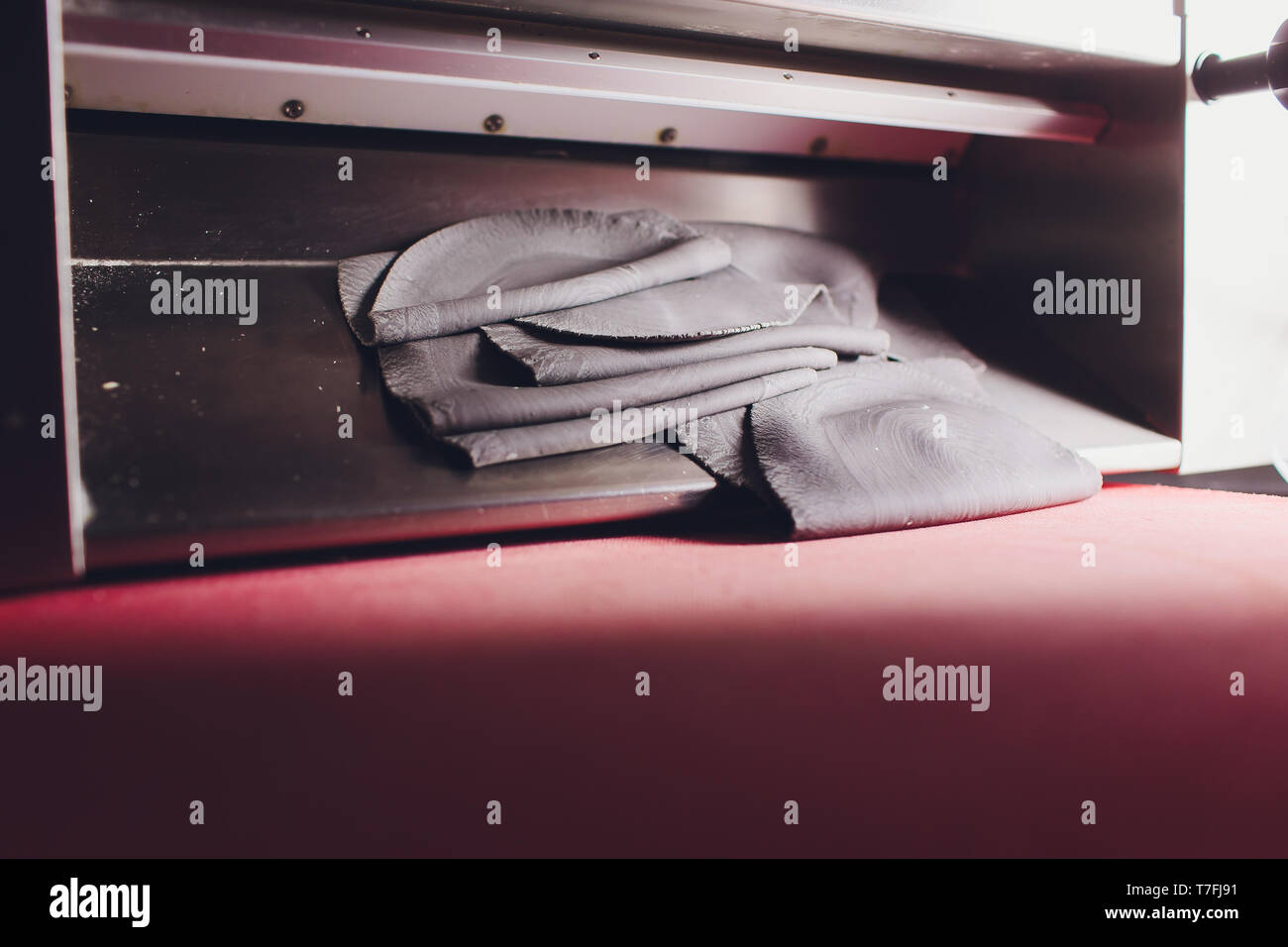 Chef making dough pastry sheeter bakery Baker forming shaping dough ...