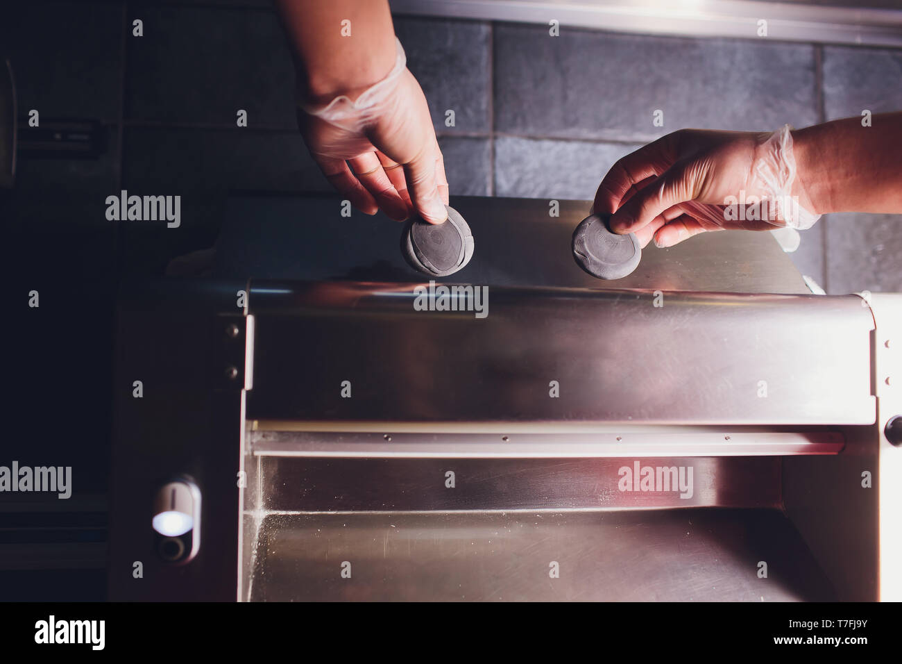 Chef making dough pastry sheeter bakery Baker forming shaping dough ...