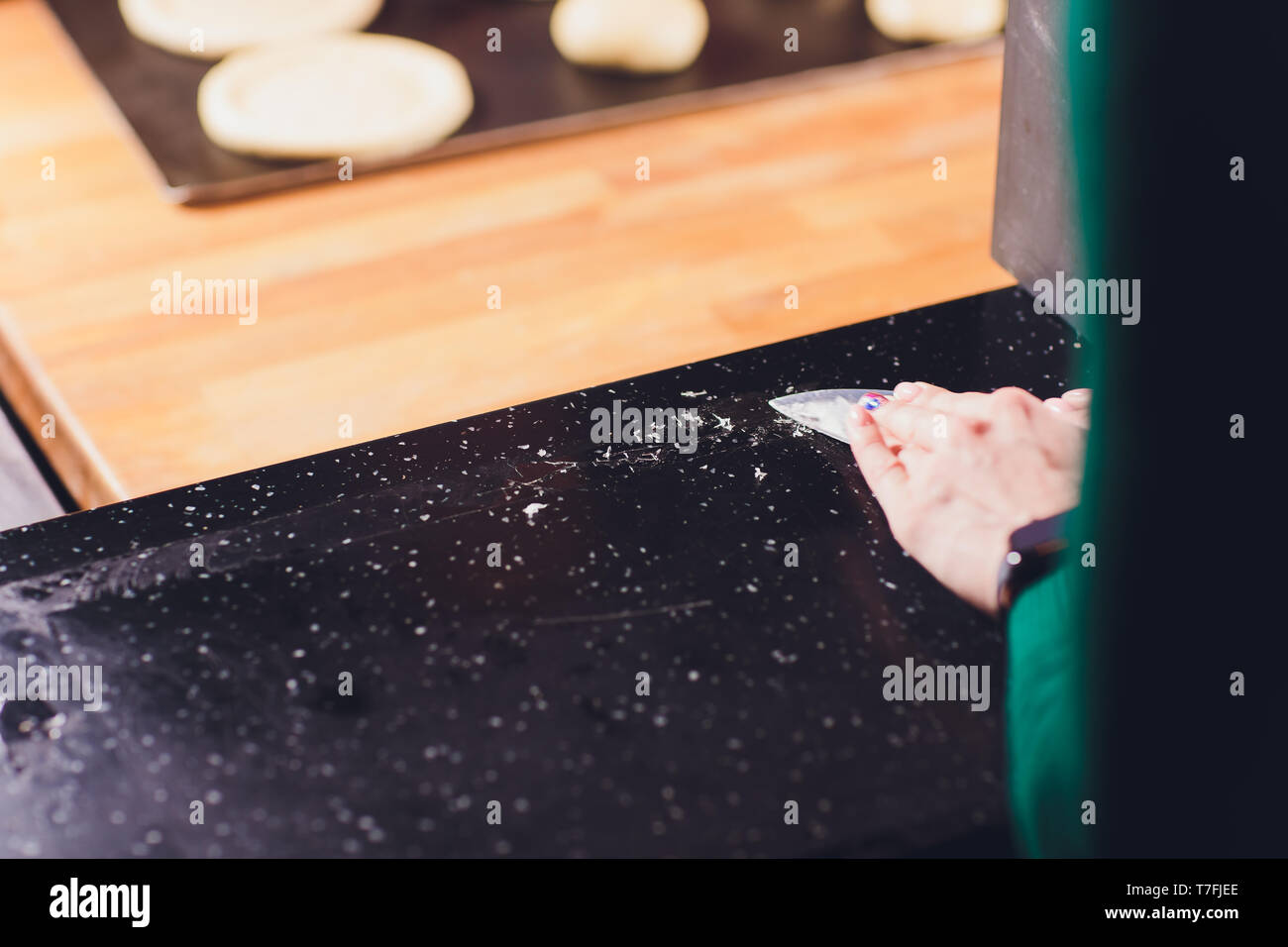 Waiter cleaning the table with Disinfectant Spray in a restaurant Stock ...