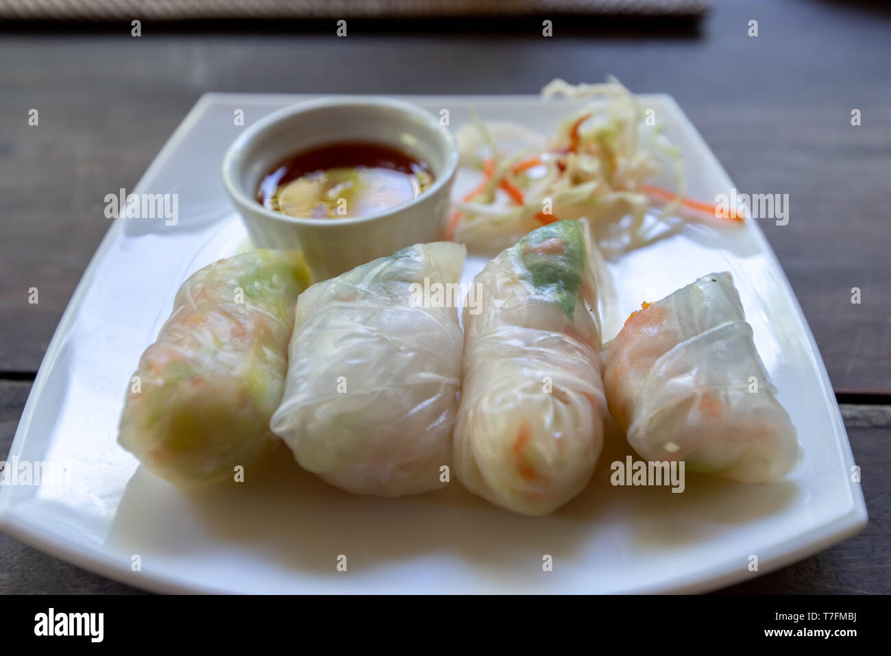 Thai style fresh spring roll with white plate Stock Photo - Alamy