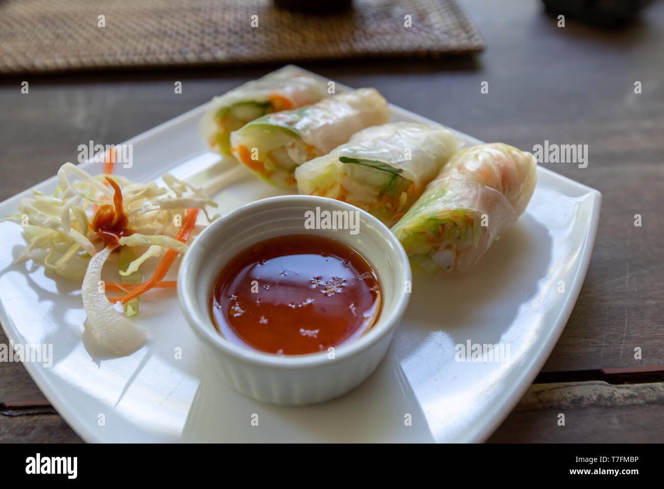 Thai style fresh spring roll with white plate Stock Photo - Alamy