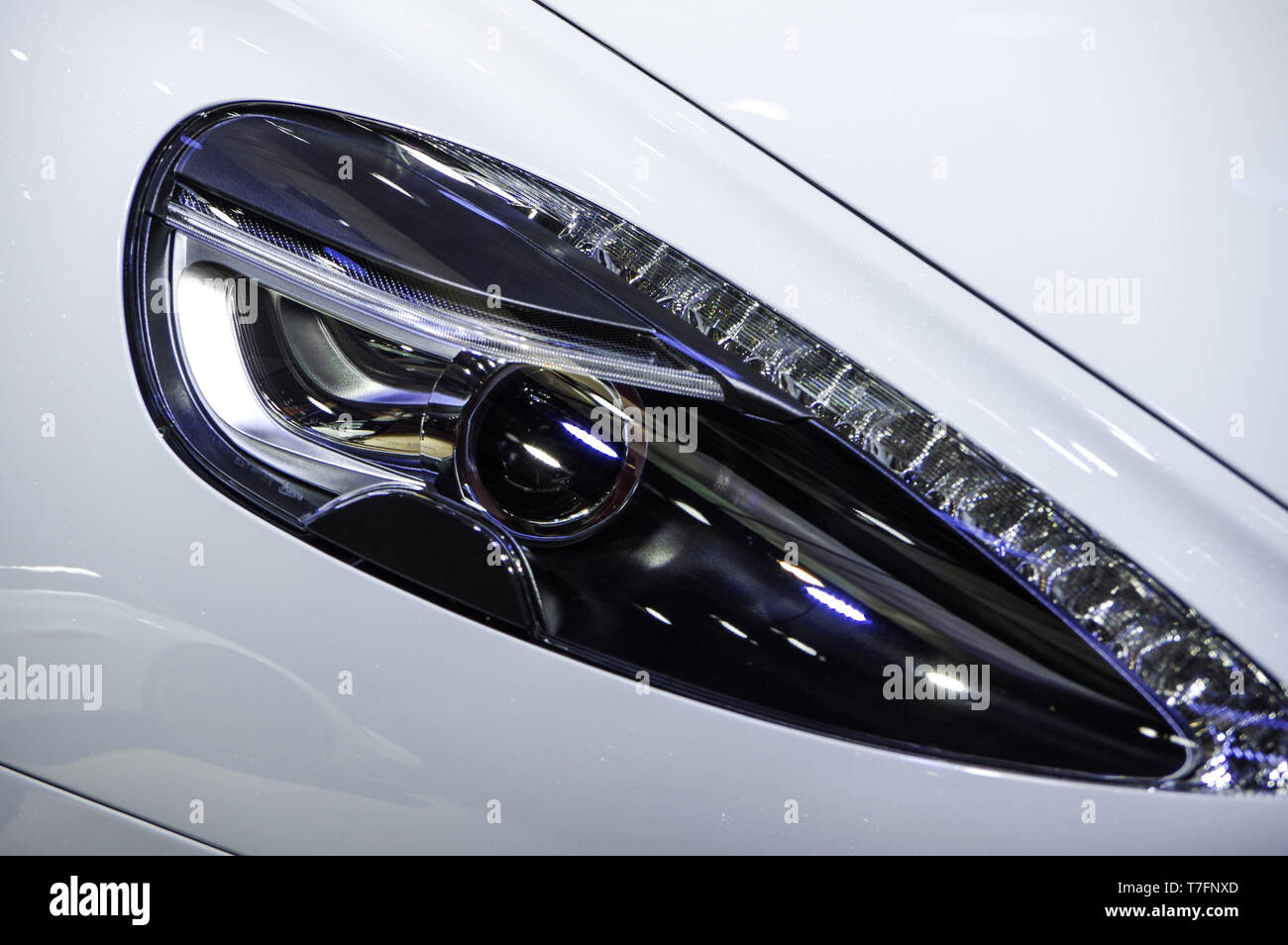 Modern white car headlight details Stock Photo - Alamy